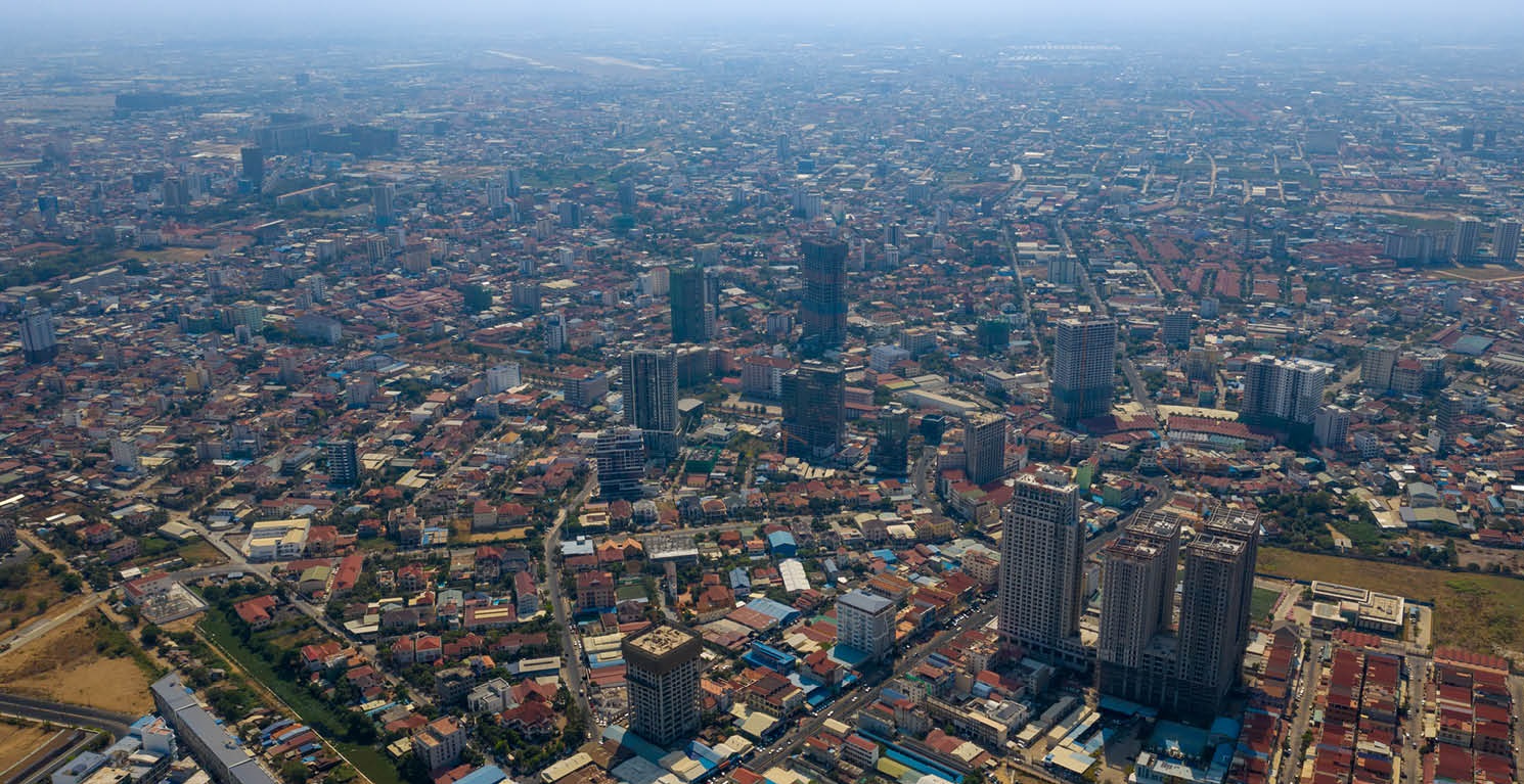 Which Commune in Toul Kork District has the Highest Land Price?